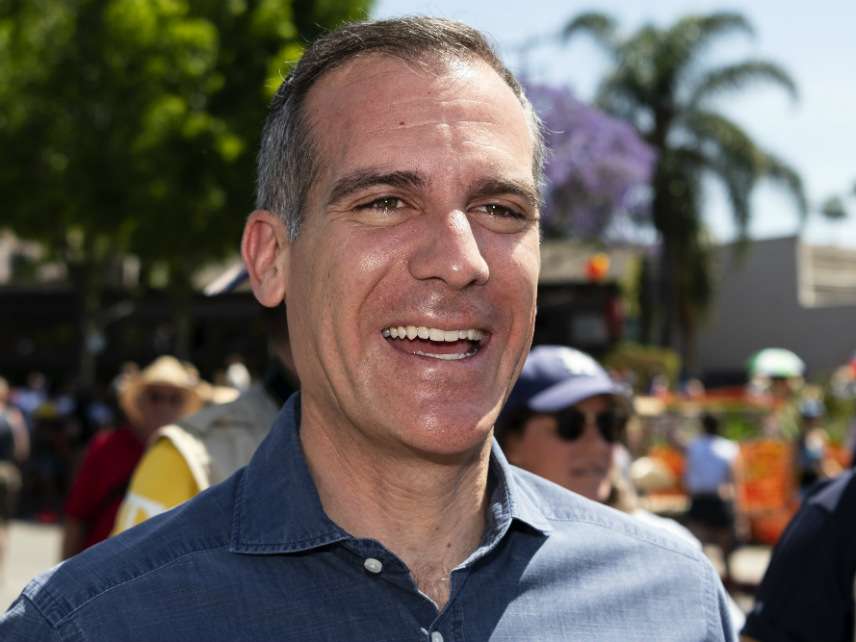 L.A. Mayor Says Gas Taxes Are Needed to Fix Roads While Standing in ...
